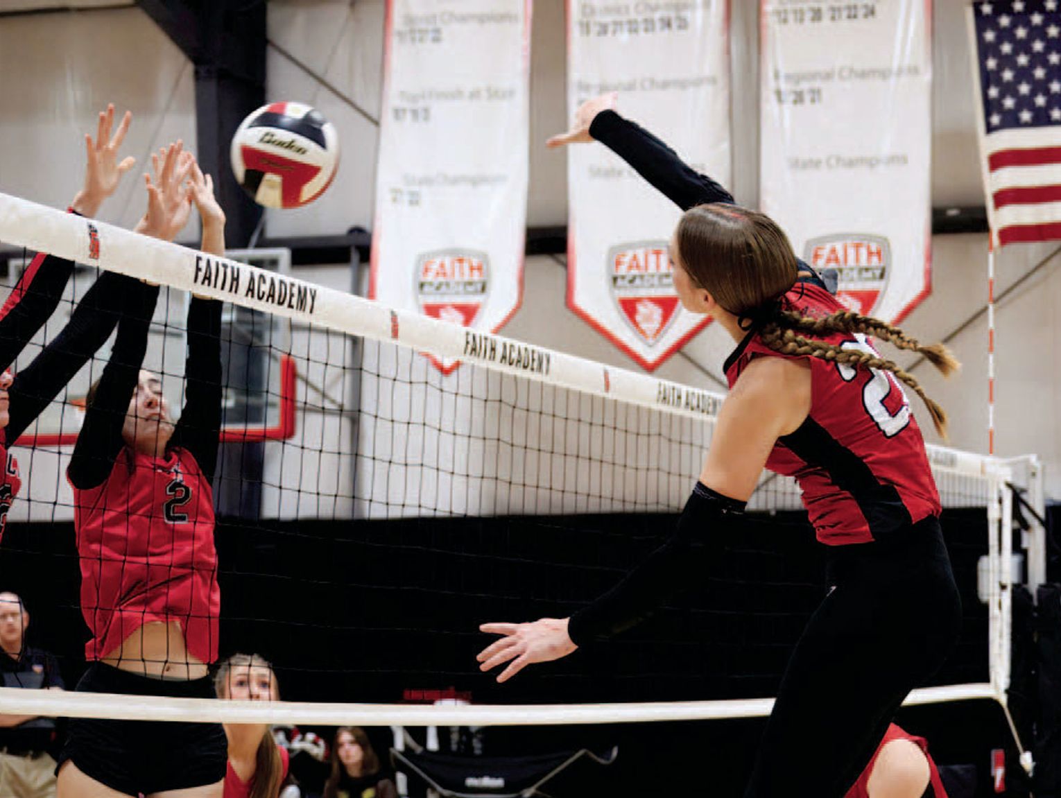 Lady Flames volleyball players earn huge road win in district play